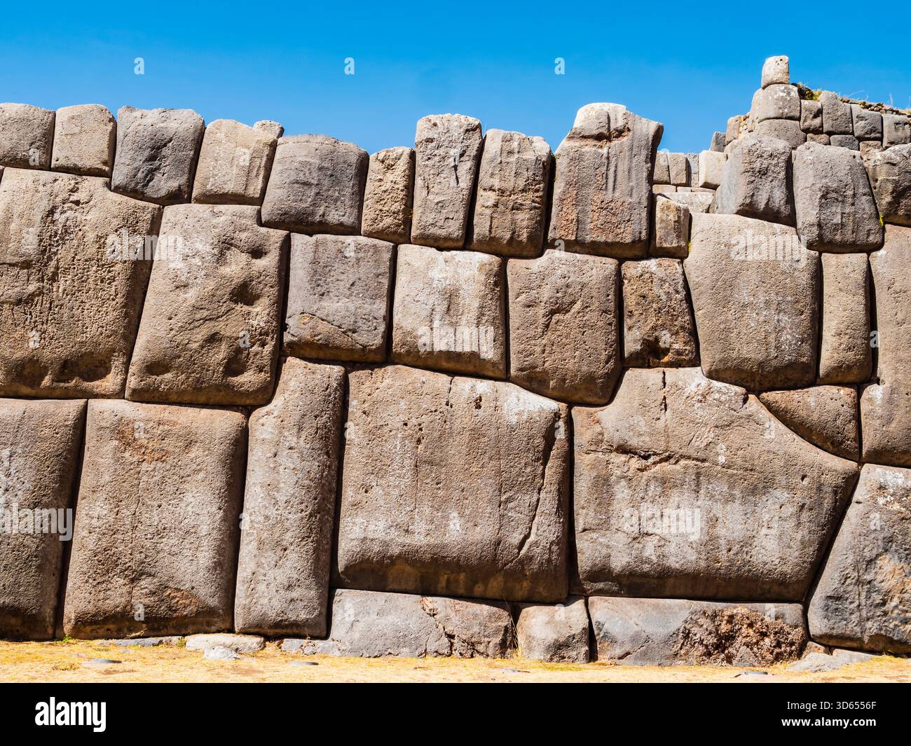Close-up view of the massive stone walls of the Inca archaeological ...
