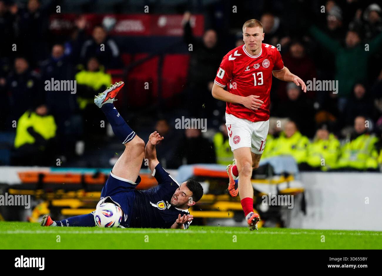 Denmark's Rasmus Kristensen and Scotland's John McGinn battle for the ...