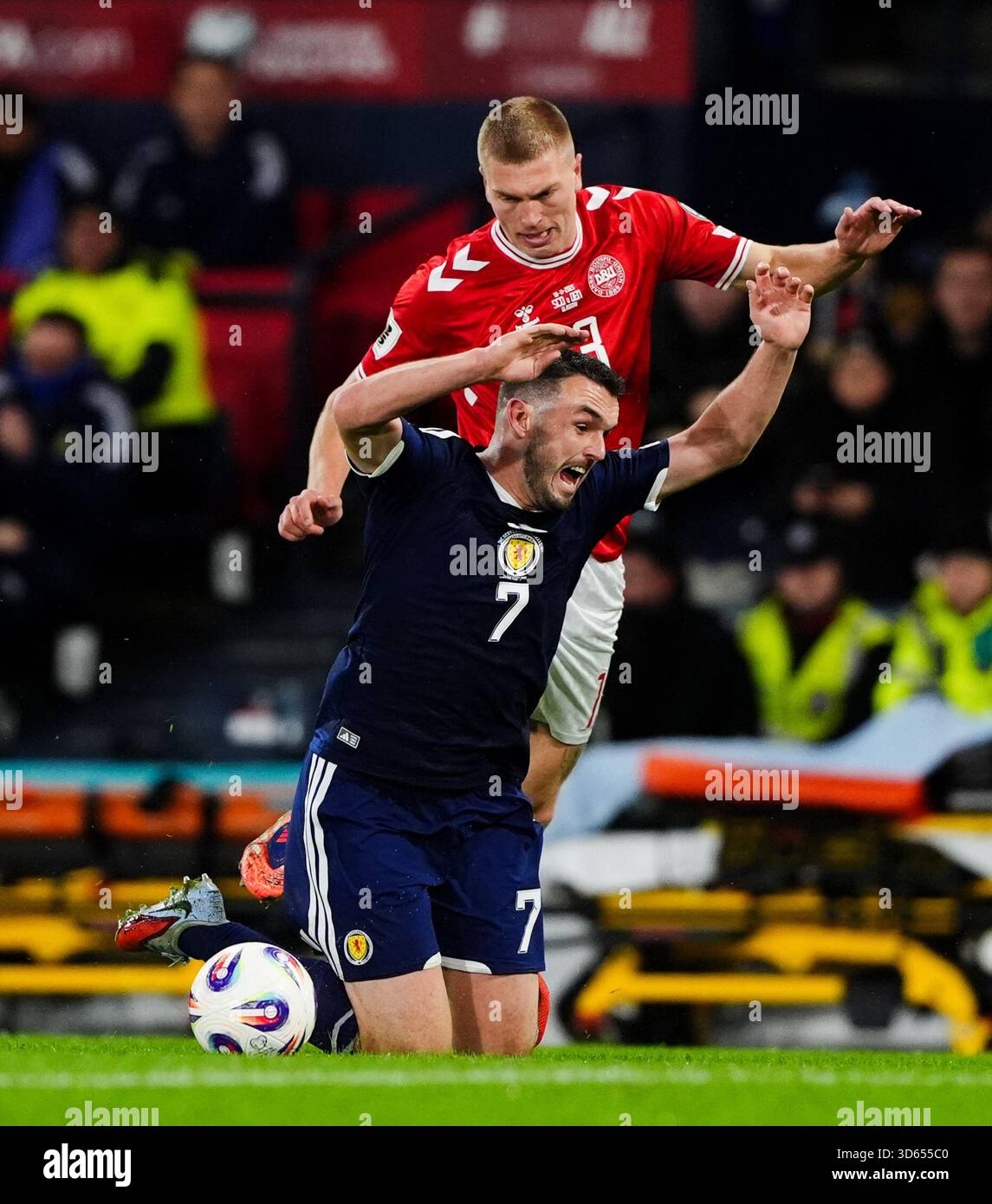 Denmark's Rasmus Kristensen and Scotland's John McGinn battle for the ...