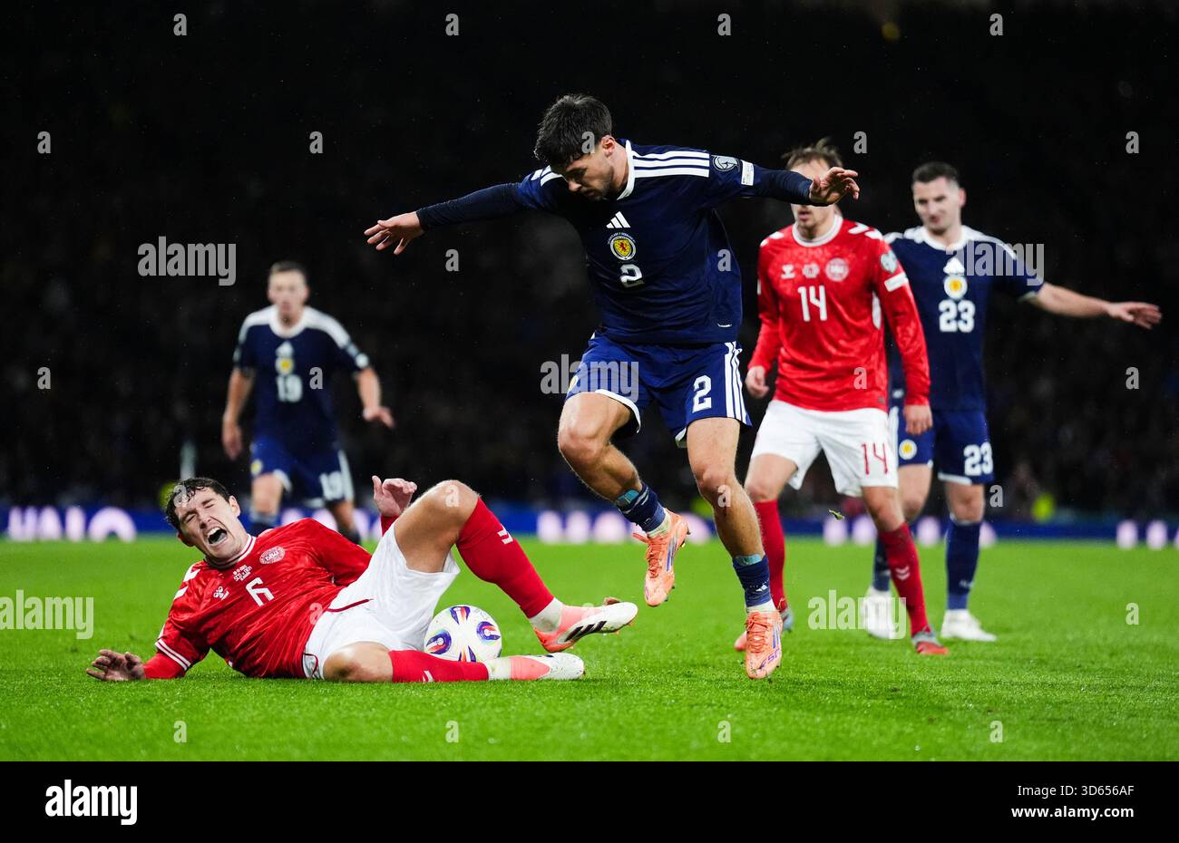 Denmark's Andreas Christensen and Scotland's Aaron Hickey battle for ...