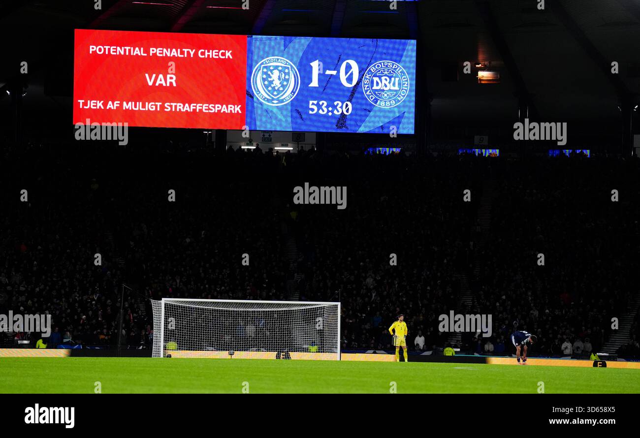 The giant screen displays a VAR penalty review during the FIFA World ...