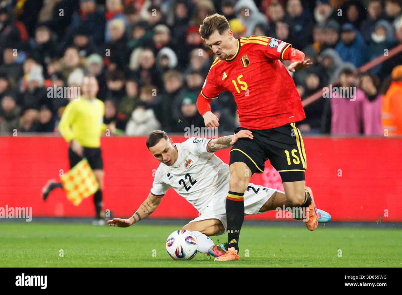 Liechtenstein's Walter Pizzi, left, challenges Belgium's Thomas Meunier ...