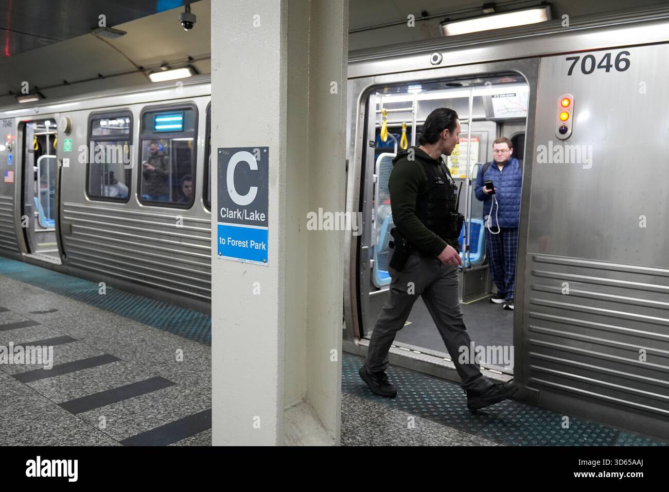 A Chicago police officer patrols the Clark Street and Lake Street Blue ...