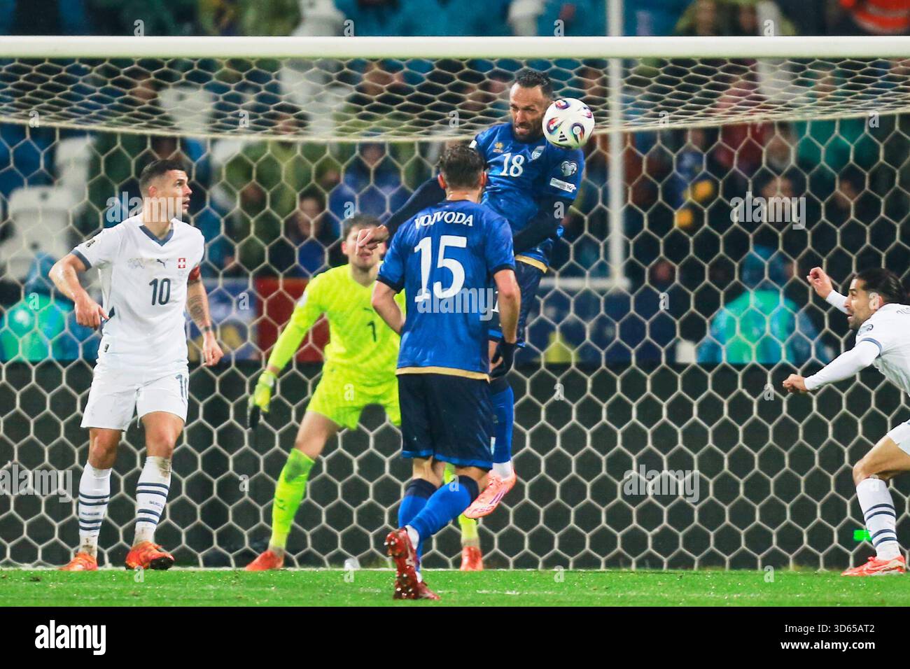 Kosovo's Vedat Muriqi, centre, in action during the 2026 World Cup ...