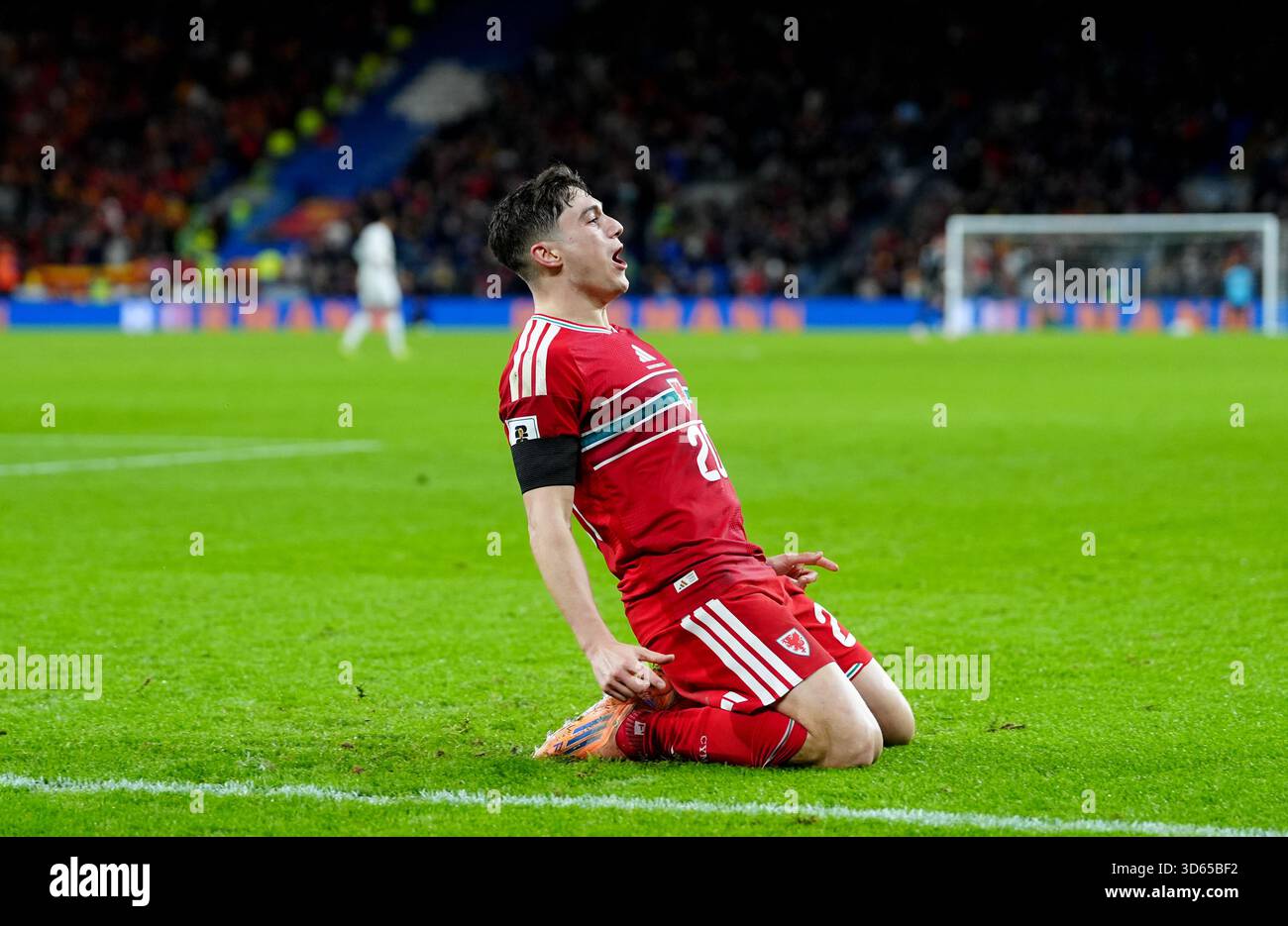 Wales' Dan James celebrates scoring their side's fourth goal of the ...