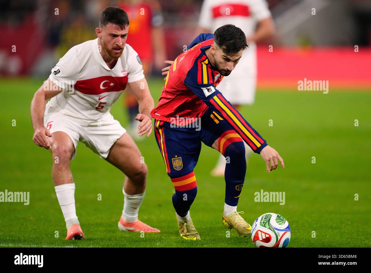 Spain's Yeremy Pino fights for the ball against Turkey's Salih Özcan ...