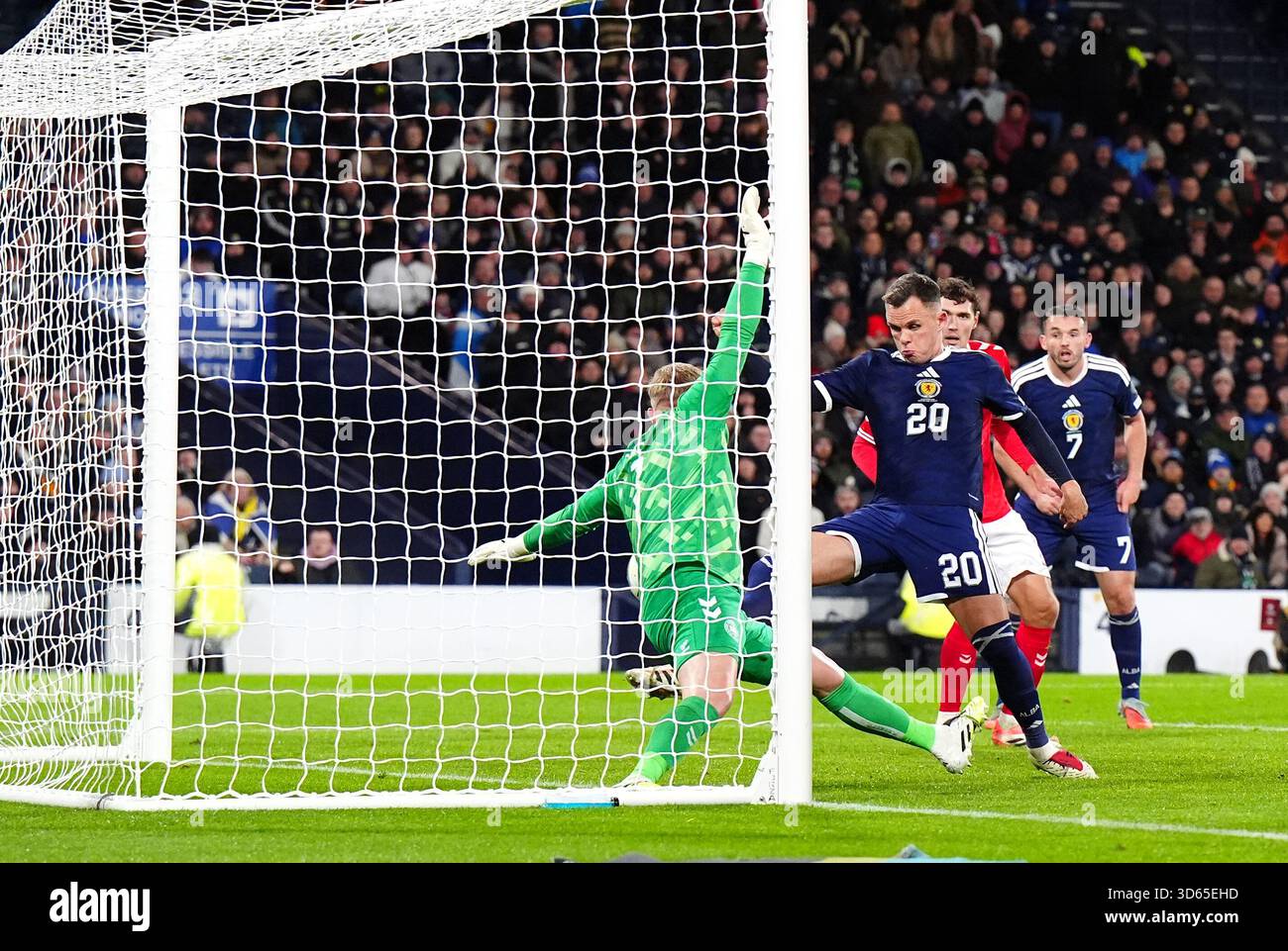 Scotland's Lawrence Shankland scores their side's second goal of the ...