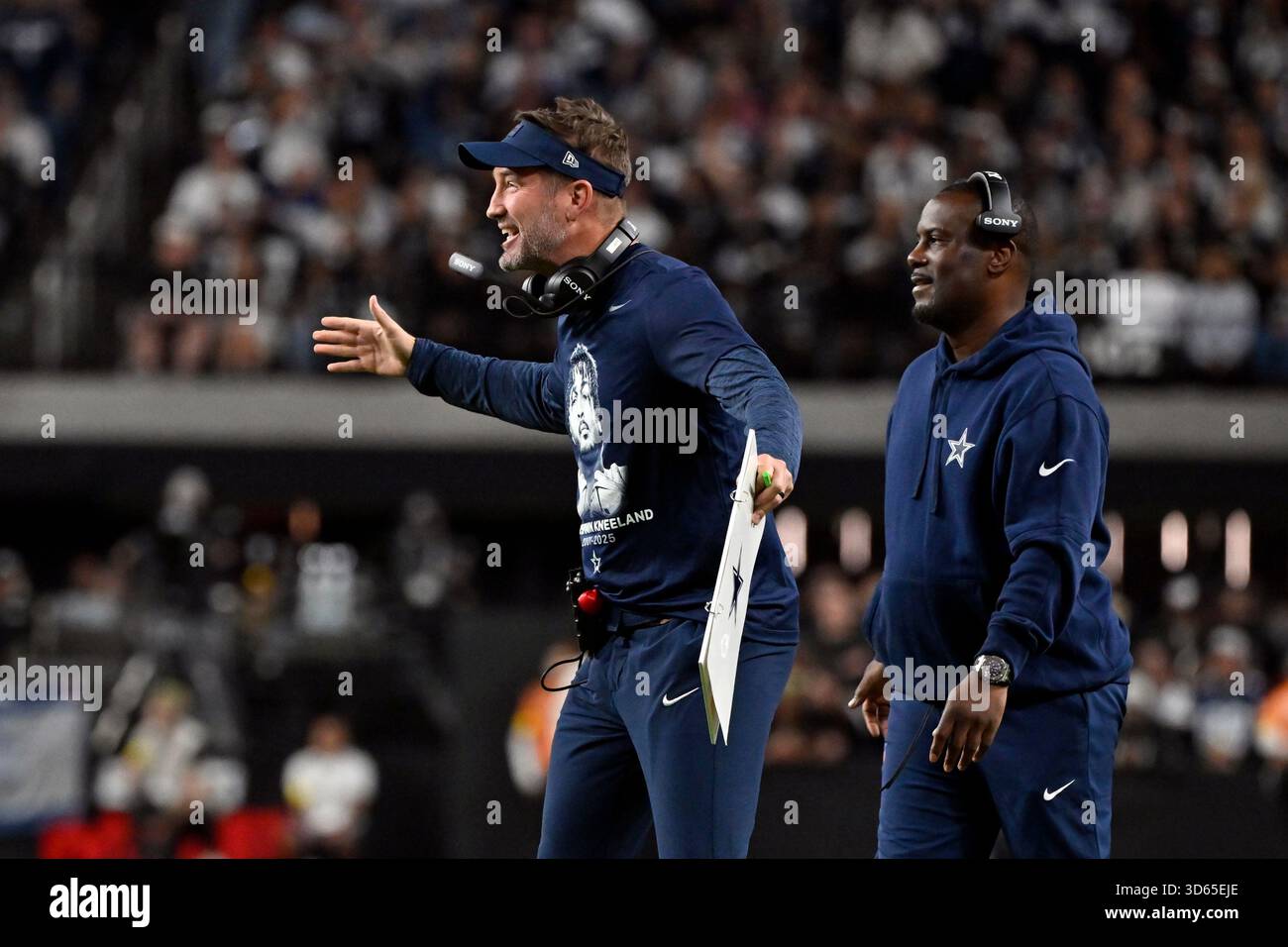 Dallas Cowboys head coach Brian Schottenheimer, left, celebrates a ...