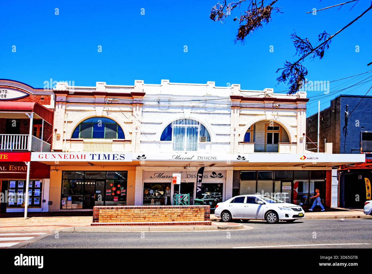 An early 20th Century two storey building housing three retail shops in ...