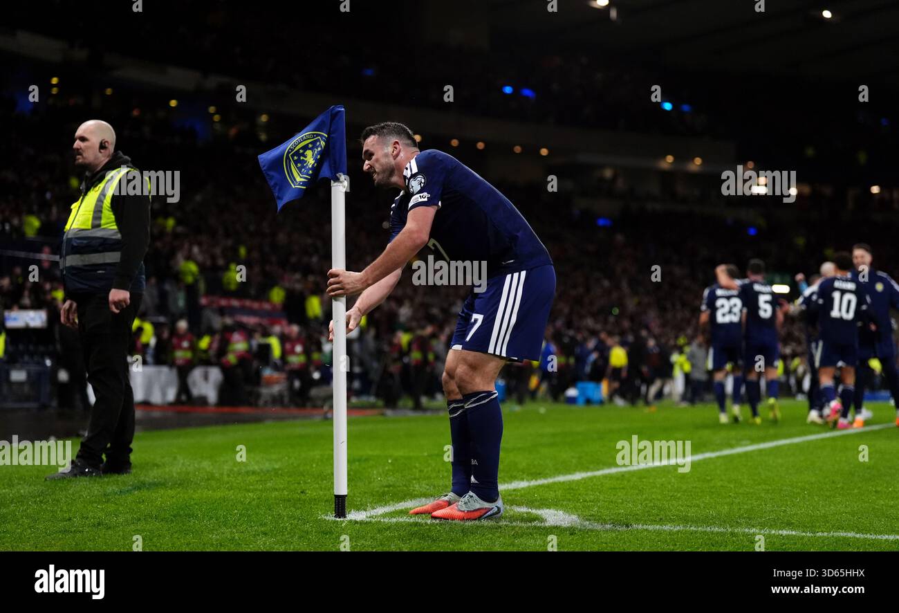Scotland's John McGinn celebrates after his side qualified for the 2026 ...