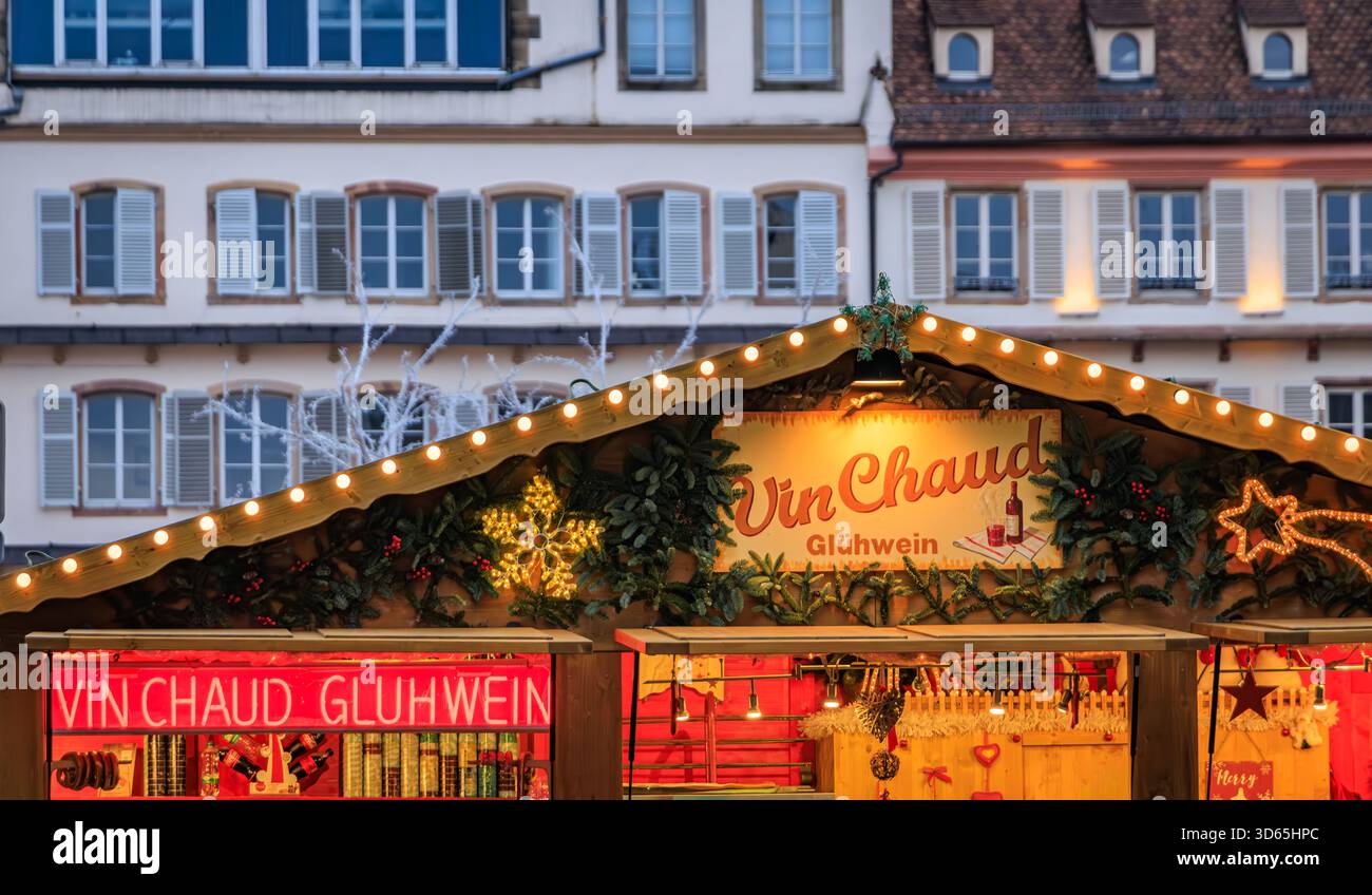 The warm glow of a cozy mulled wine stall with festive lights under the ...