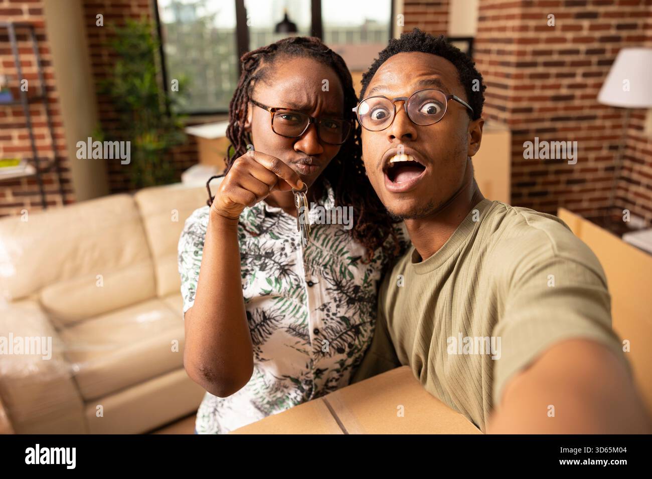 African young couple happily taking hi-res stock photography and images ...