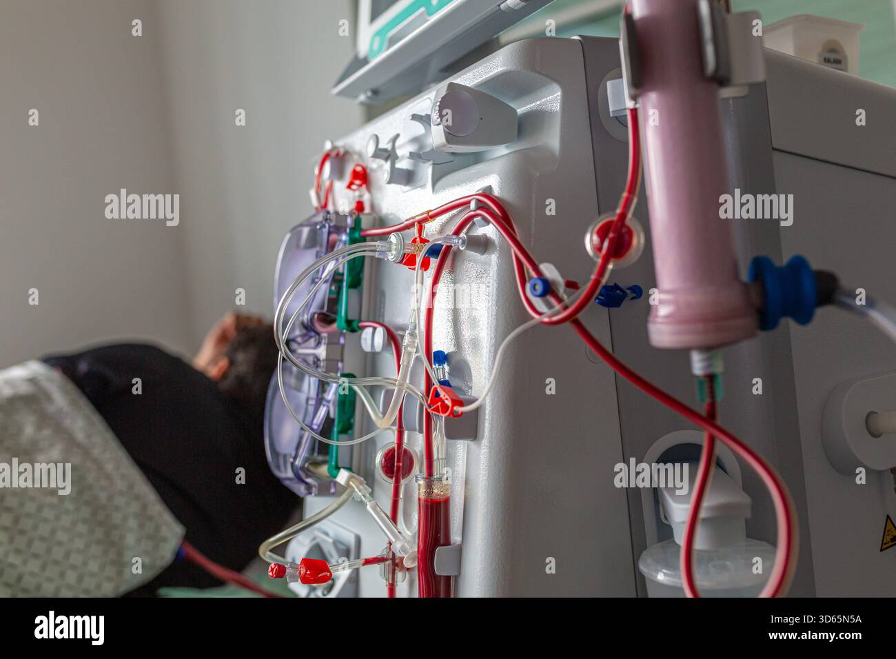 Germany, Bavaria, Munich, Portrait photograph of a man in the dialysis ...