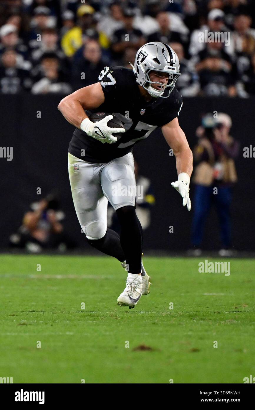 Las Vegas Raiders tight end Michael Mayer (87) runs with the ball ...