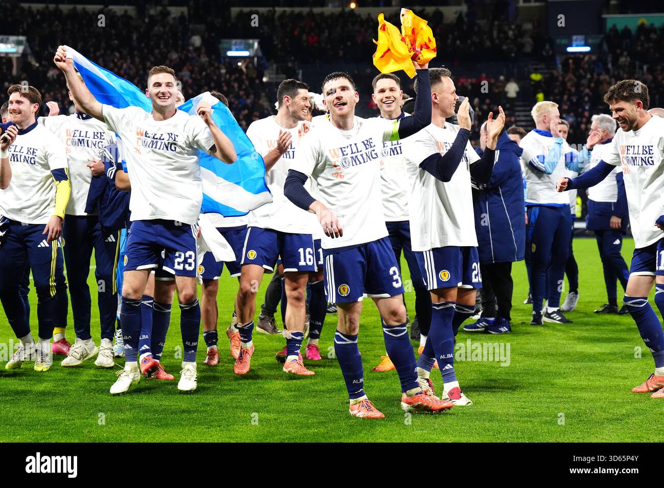Scotland's Andrew Robertson (centre) celebrates with team-mates after ...