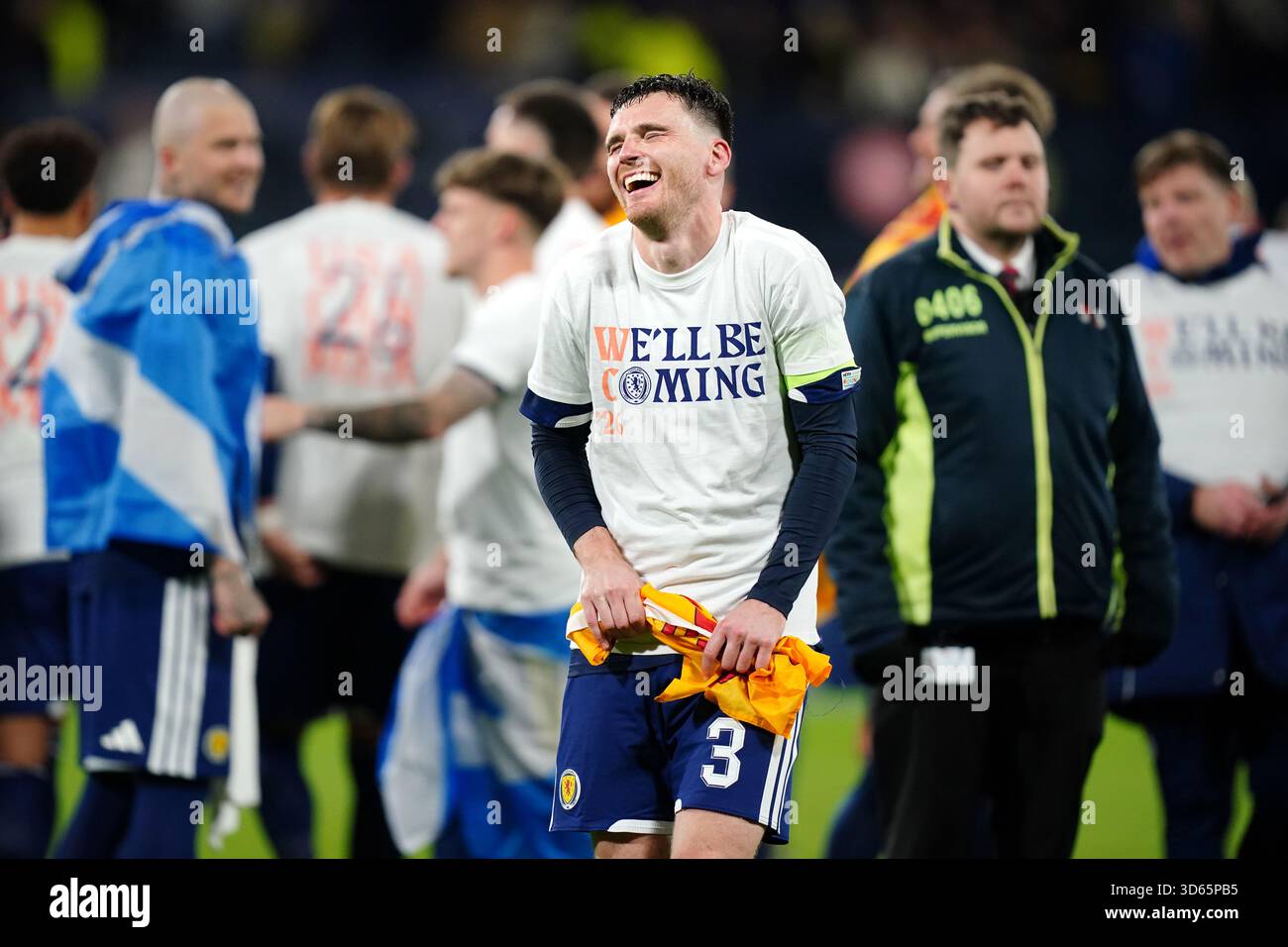 Scotland's Andrew Robertson (centre) celebrates after qualifying for ...