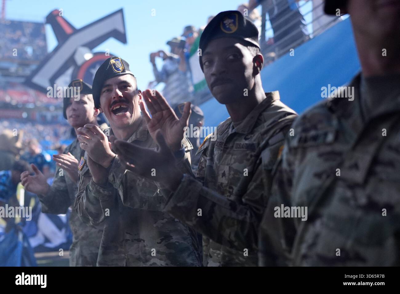 Members of the Army's 101st Airborne Division attend an NFL football ...