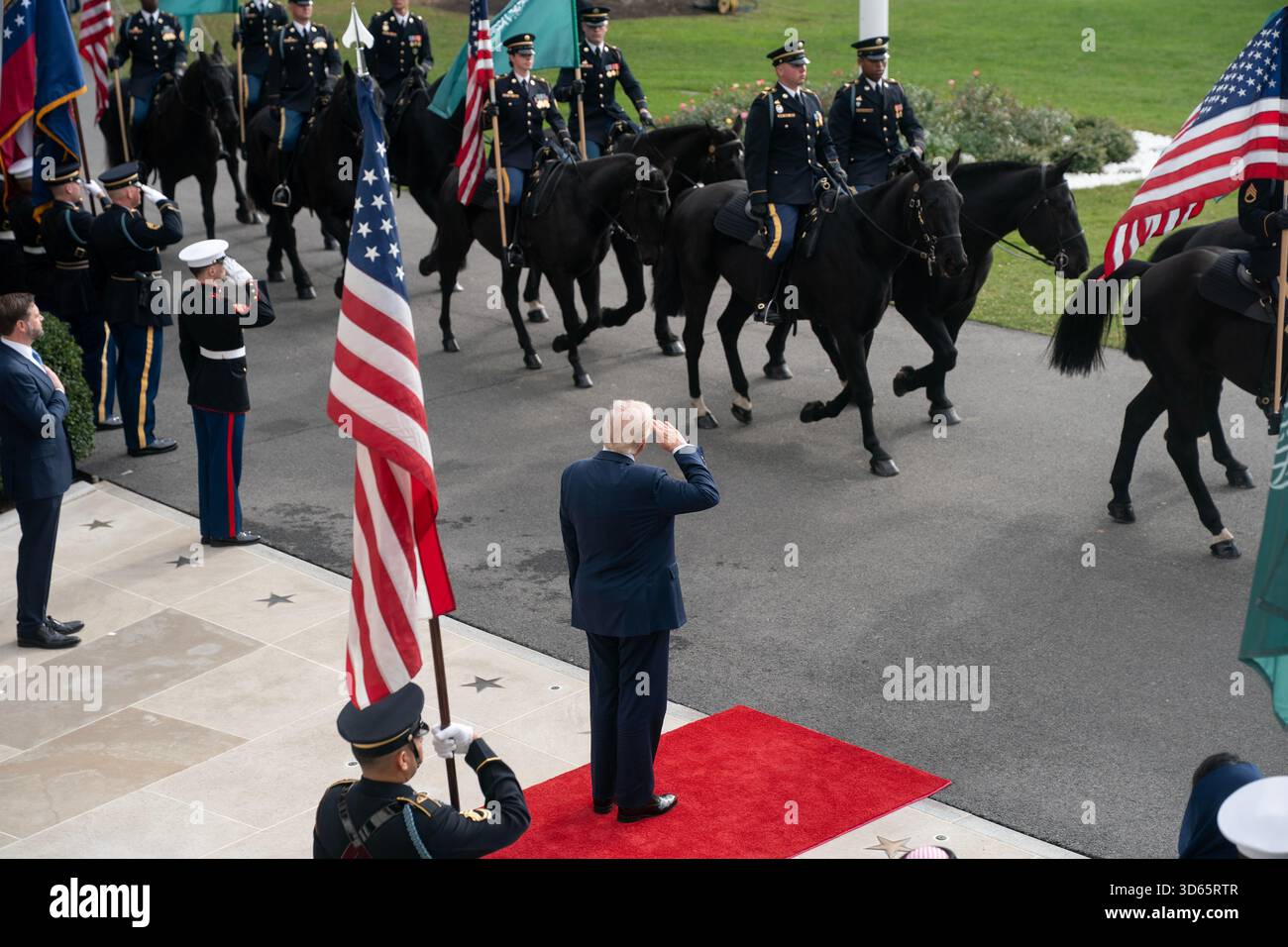 United States President Donald J Trump salutes the troops as he awaits ...