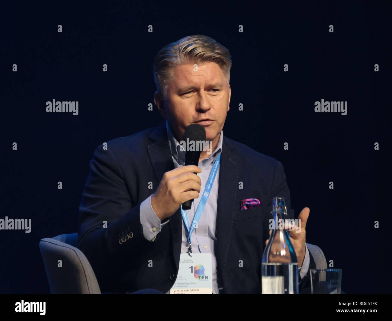 Marcin Matczak speaks at the panel discussion as scientists, activists ...