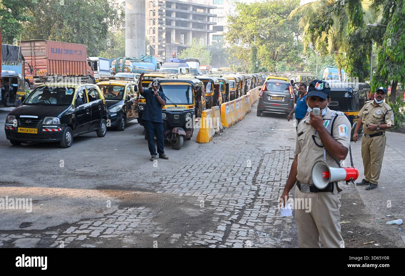 MUMBAI, INDIA - NOVEMBER 18: Long line of autorickshaws wait outside ...