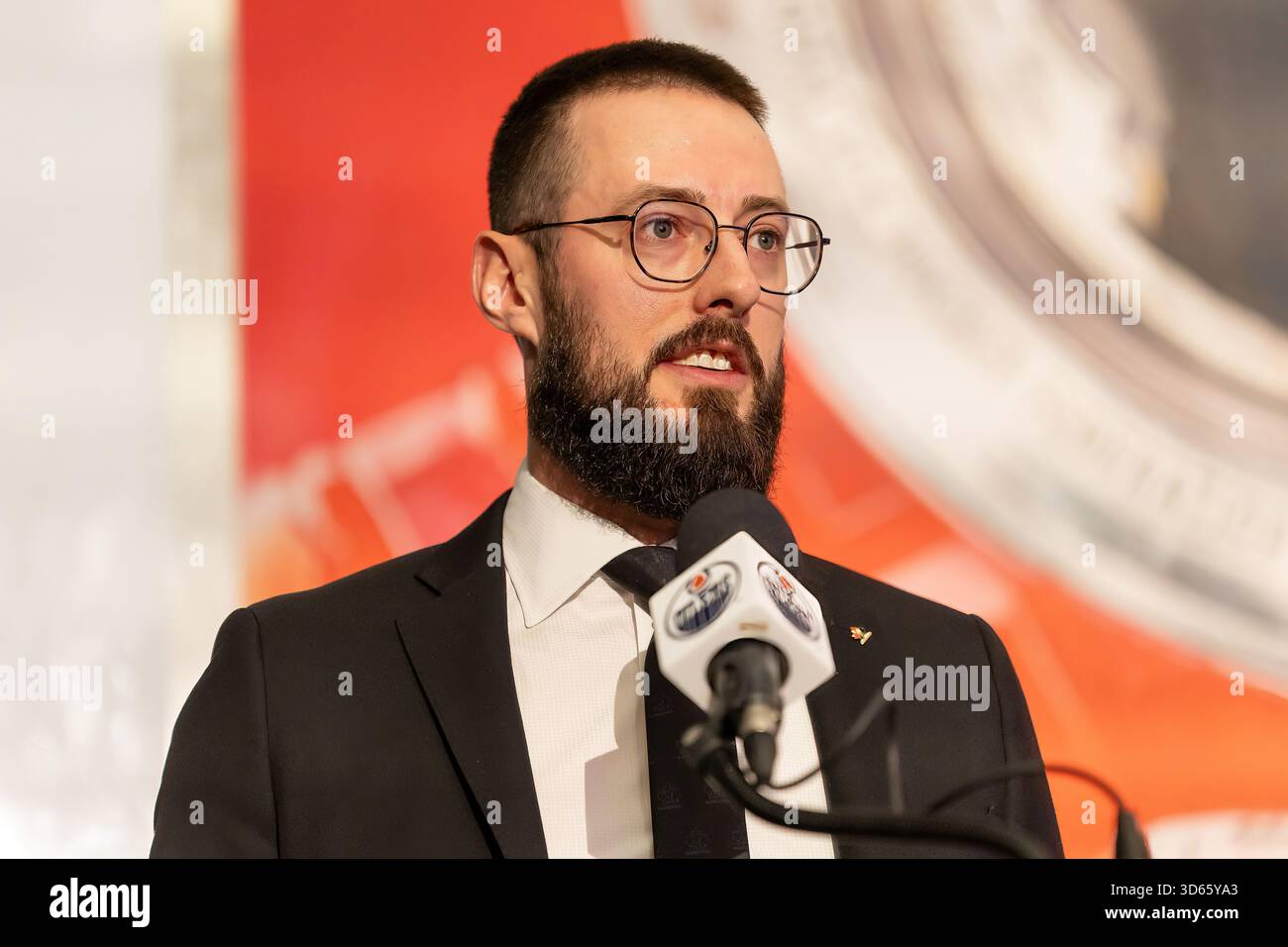 Spencer Sharkey, Manager of Communications with Hockey Canada speaks at ...
