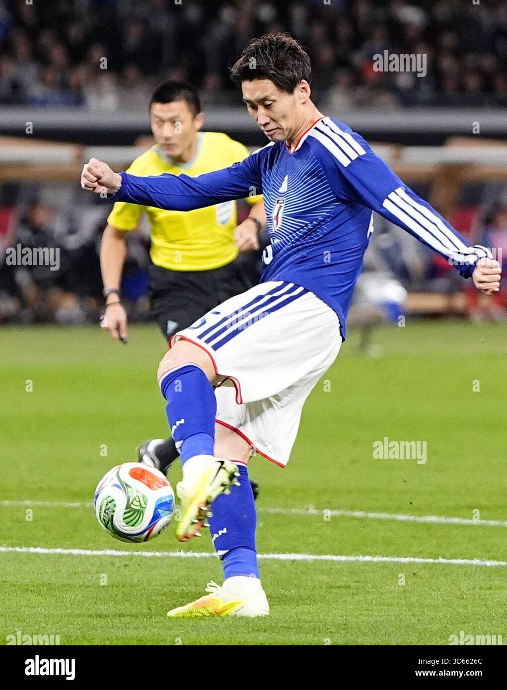 Daichi Kamada of Japan opens the scoring during the first half of an ...