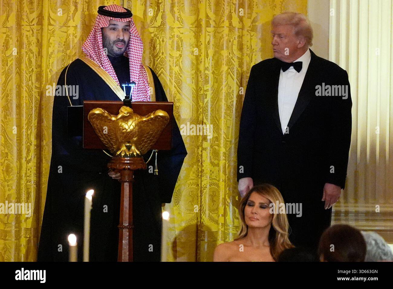 President Donald Trump listens as Saudi Arabia's Crown Prince Mohammed ...