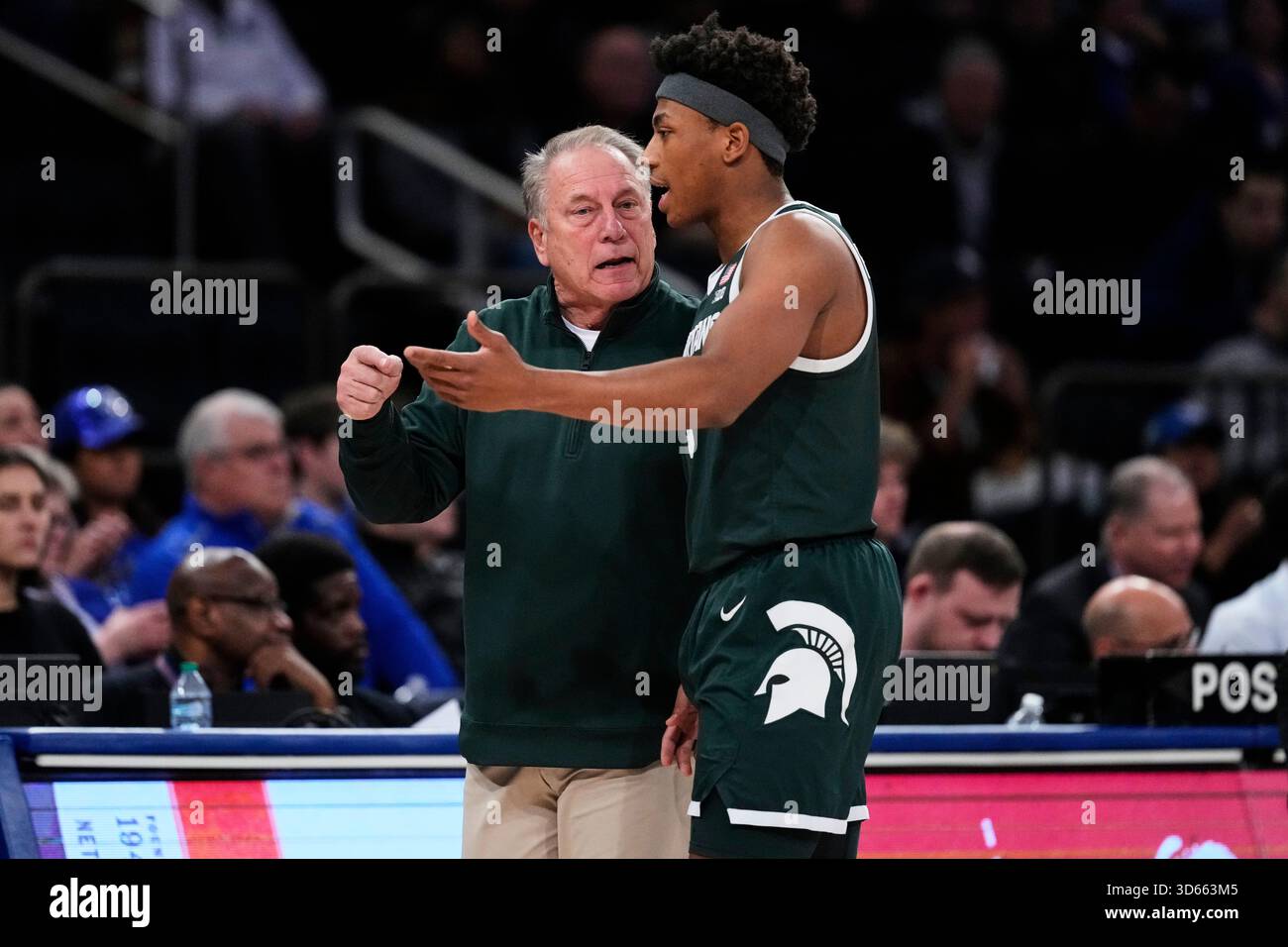 Michigan State head coach Tom Izzo, left, talks to Jeremy Fears Jr ...