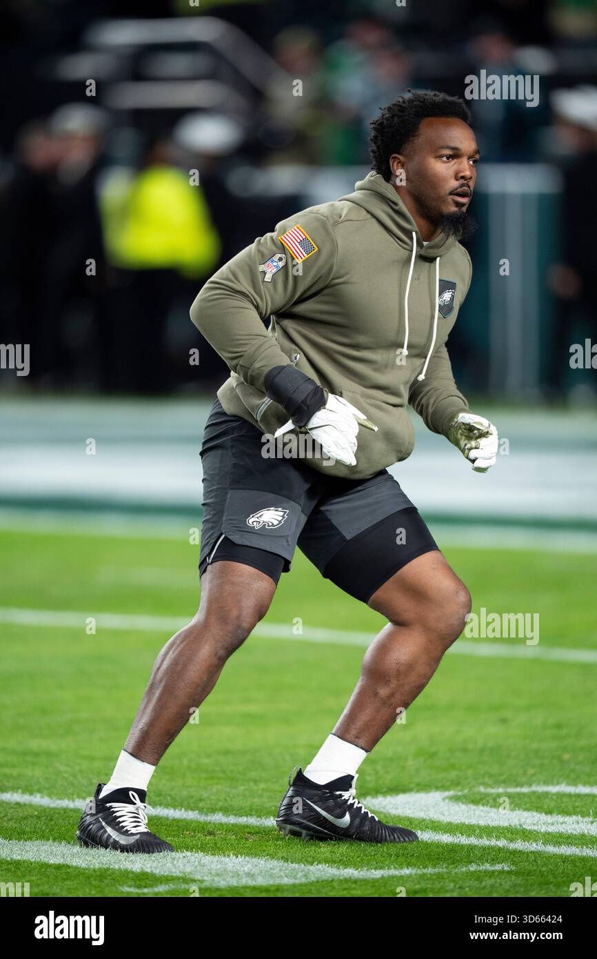 Philadelphia Eagles linebacker Nakobe Dean warms up while wearing ...