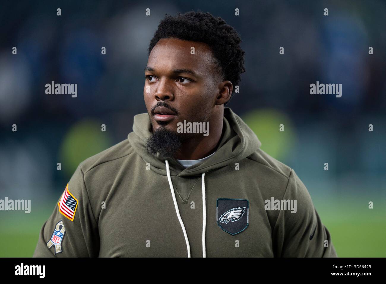 Philadelphia Eagles linebacker Nakobe Dean looks on while wearing ...