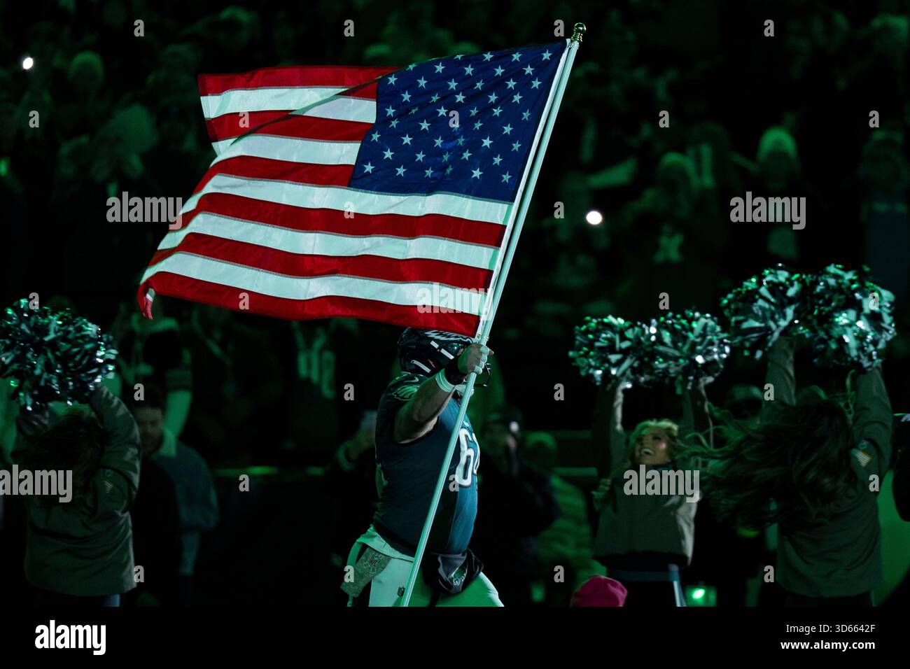 Philadelphia Eagles guard Brett Toth takes the field with the American ...