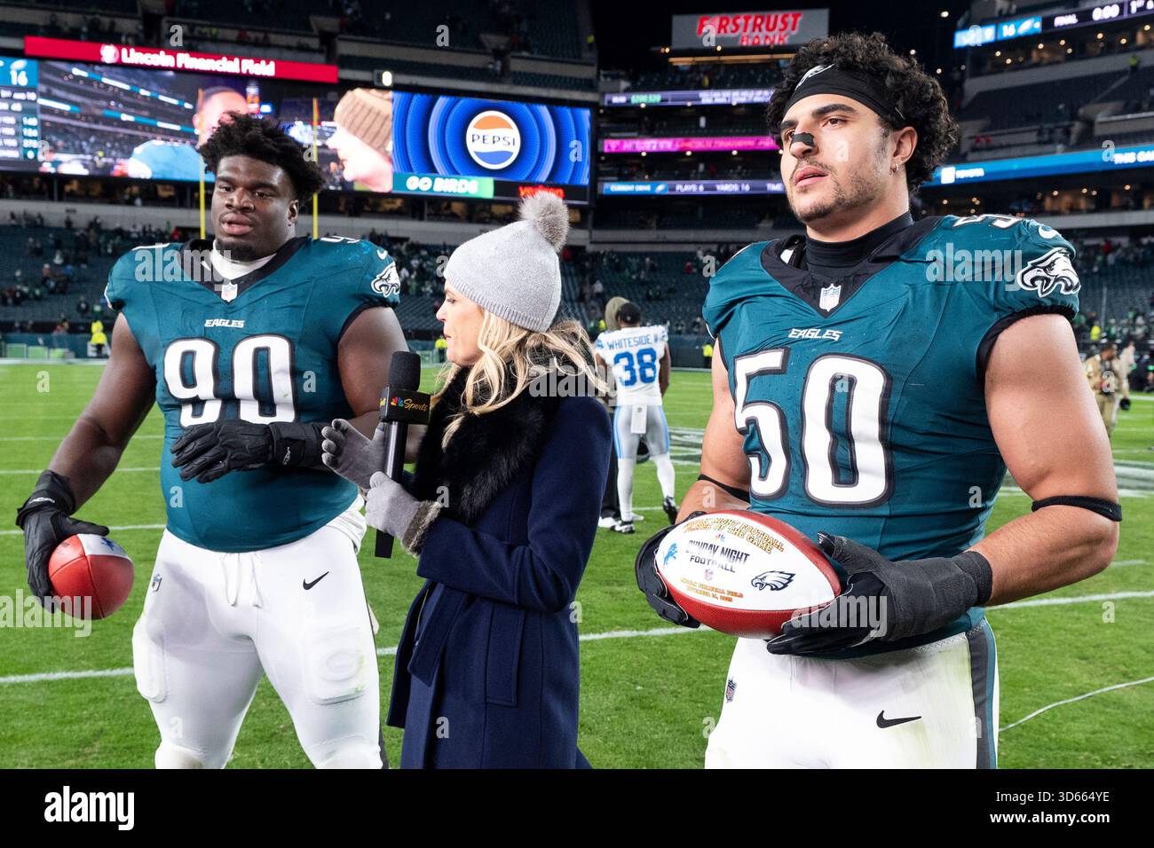 Philadelphia Eagles defensive tackle Jordan Davis, left, and linebacker ...