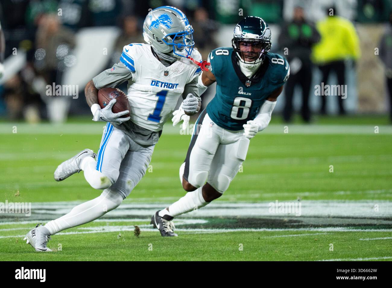 Detroit Lions wide receiver Jameson Williams, left, in action against ...