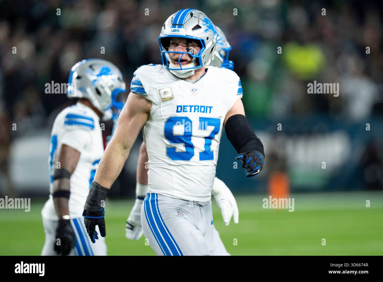 Detroit Lions defensive edge Aidan Hutchinson looks on during an NFL football game against the ...