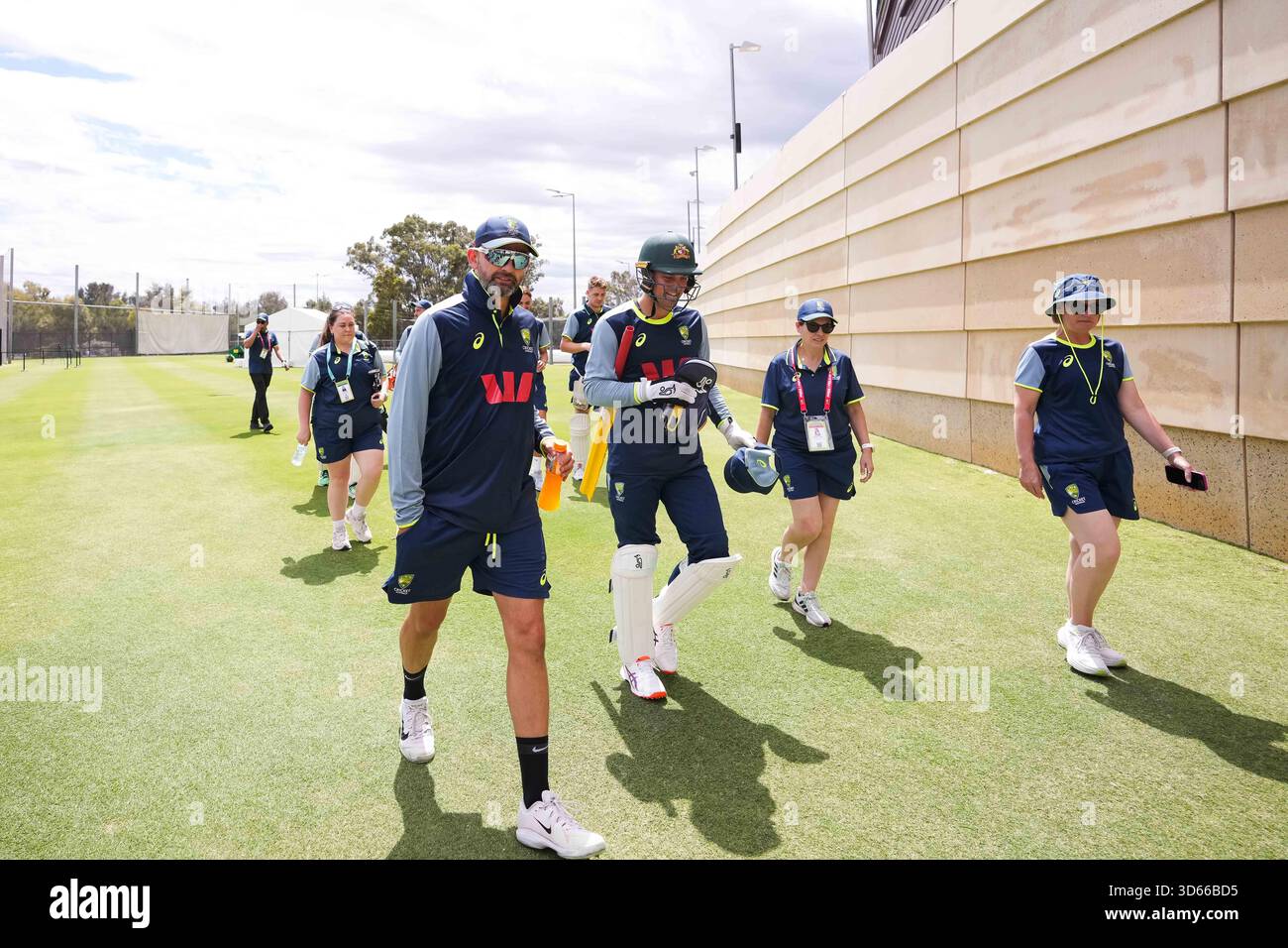 Australia's Nathan Lyon (left) and Australia's Alex Carey (centre ...
