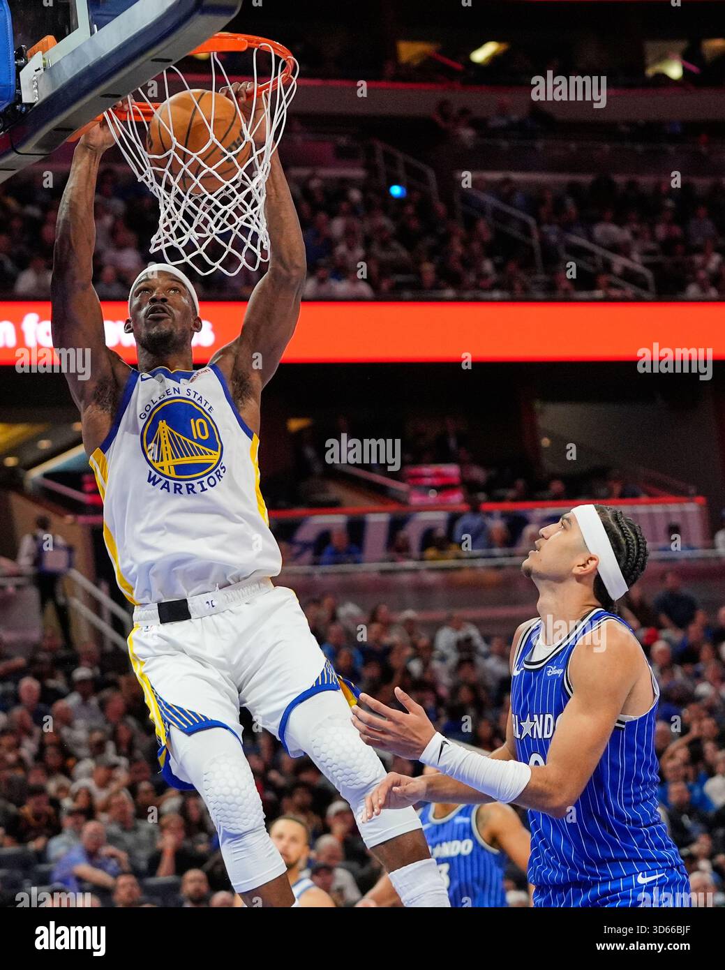 Golden State Warriors forward Jimmy Butler III (10) dunks over Orlando ...