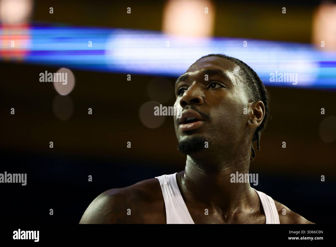 UCLA forward Eric Dailey Jr. looks on before an NCAA college basketball ...