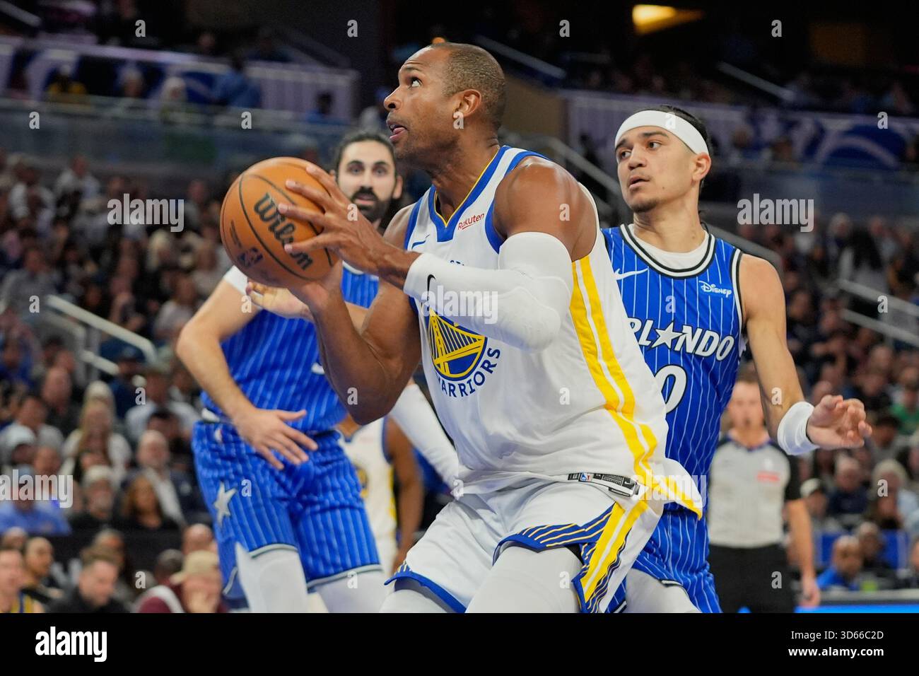 Golden State Warriors center Al Horford, left, takes a shot in front of ...