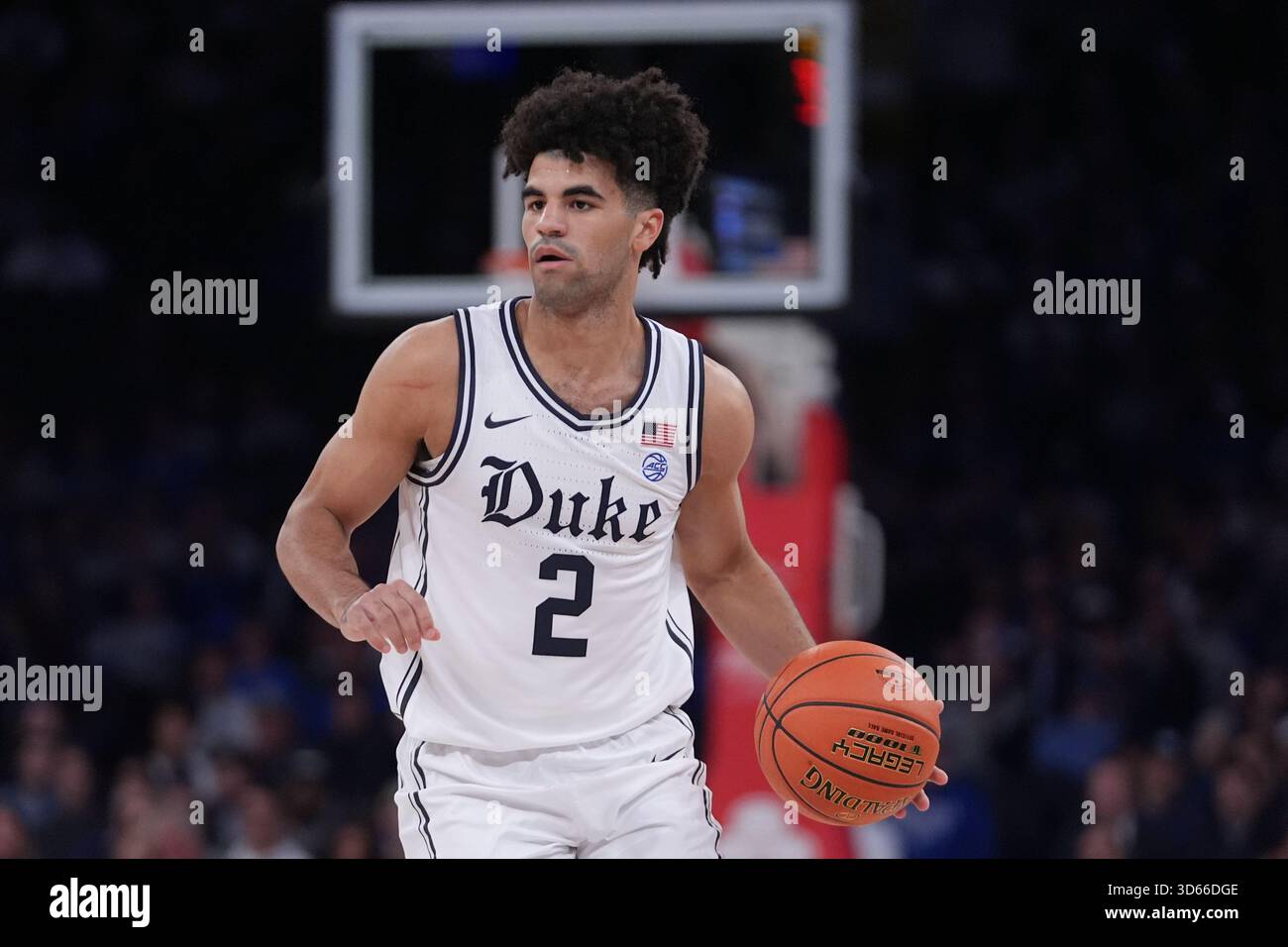 Duke's Cayden Boozer (2) looks to pass during the first half of an NCAA ...