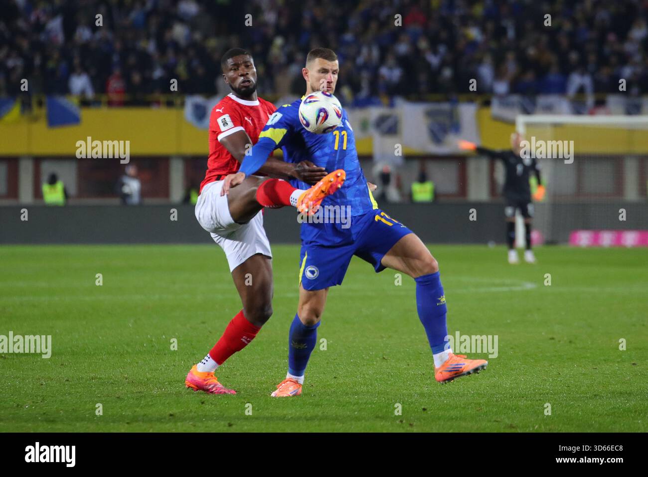 VIENNA, AUSTRIA - NOVEMBER 18: Kevin Danso of Austria and Edin Dzeko of ...