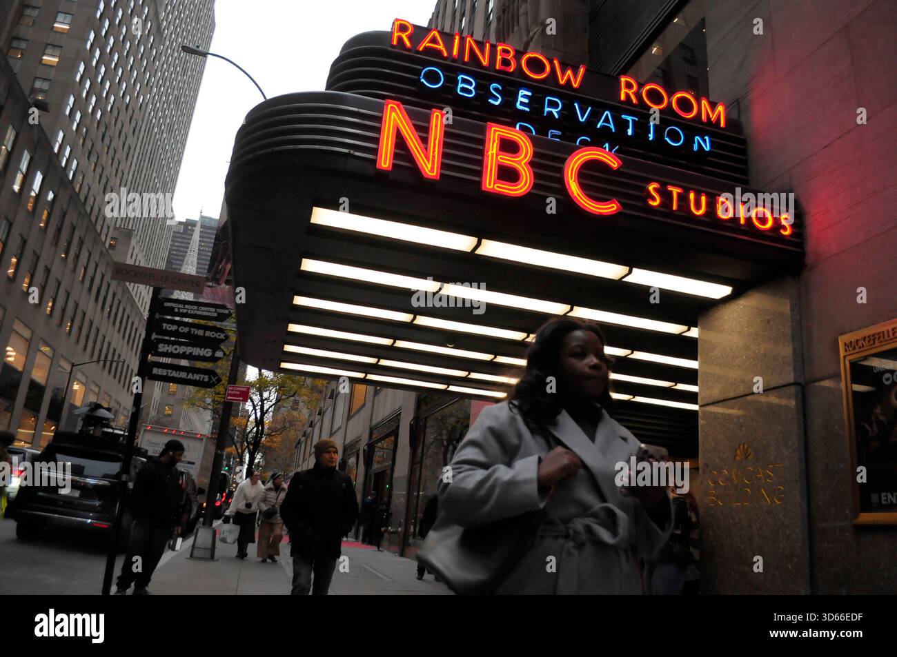 People walk past NBC studios in Manhattan, New York City. (Photo by ...