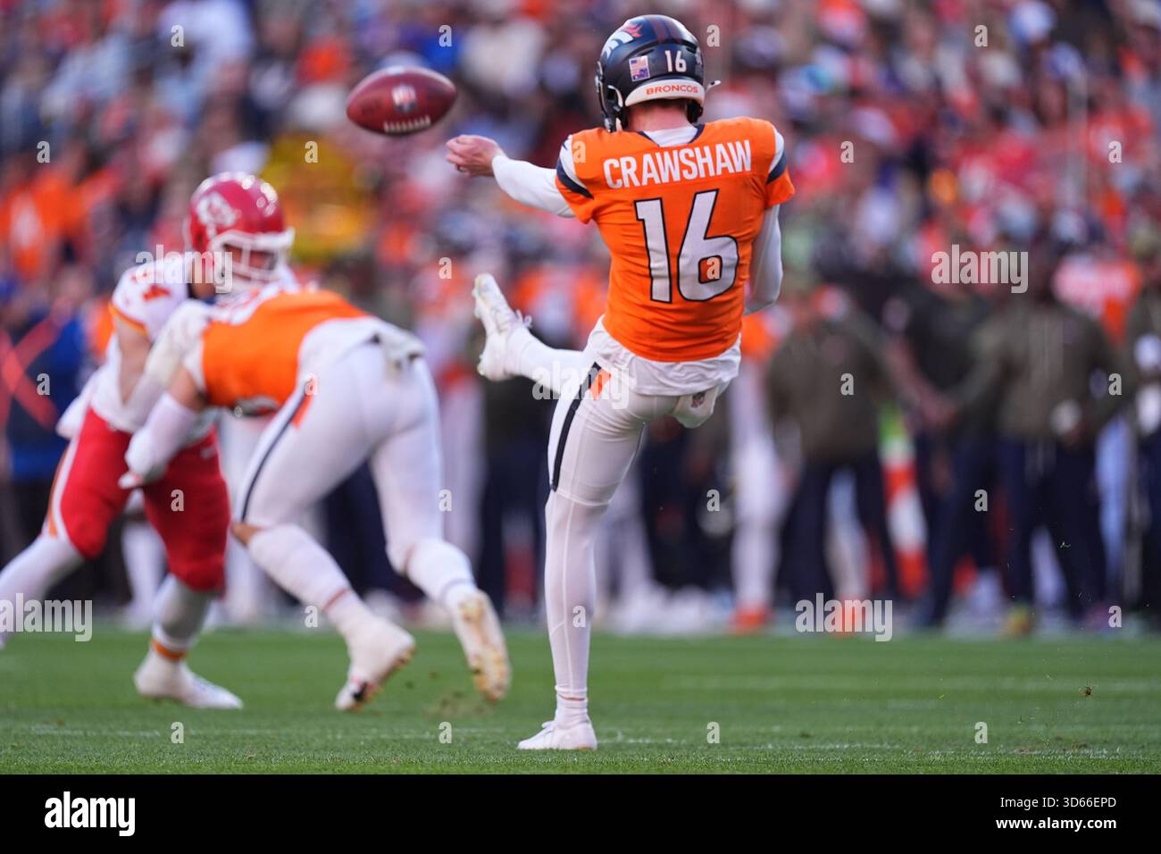 Denver Broncos punter Jeremy Crawshaw (16) in the first half of an NFL ...