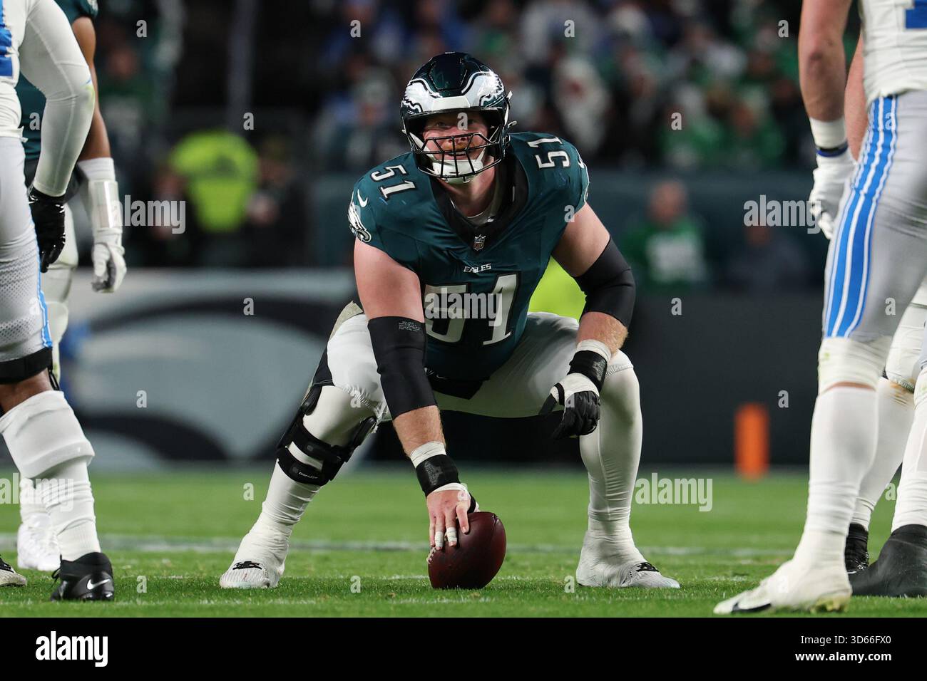 Philadelphia Eagles center Cam Jurgens (51) sets to hike the ball ...
