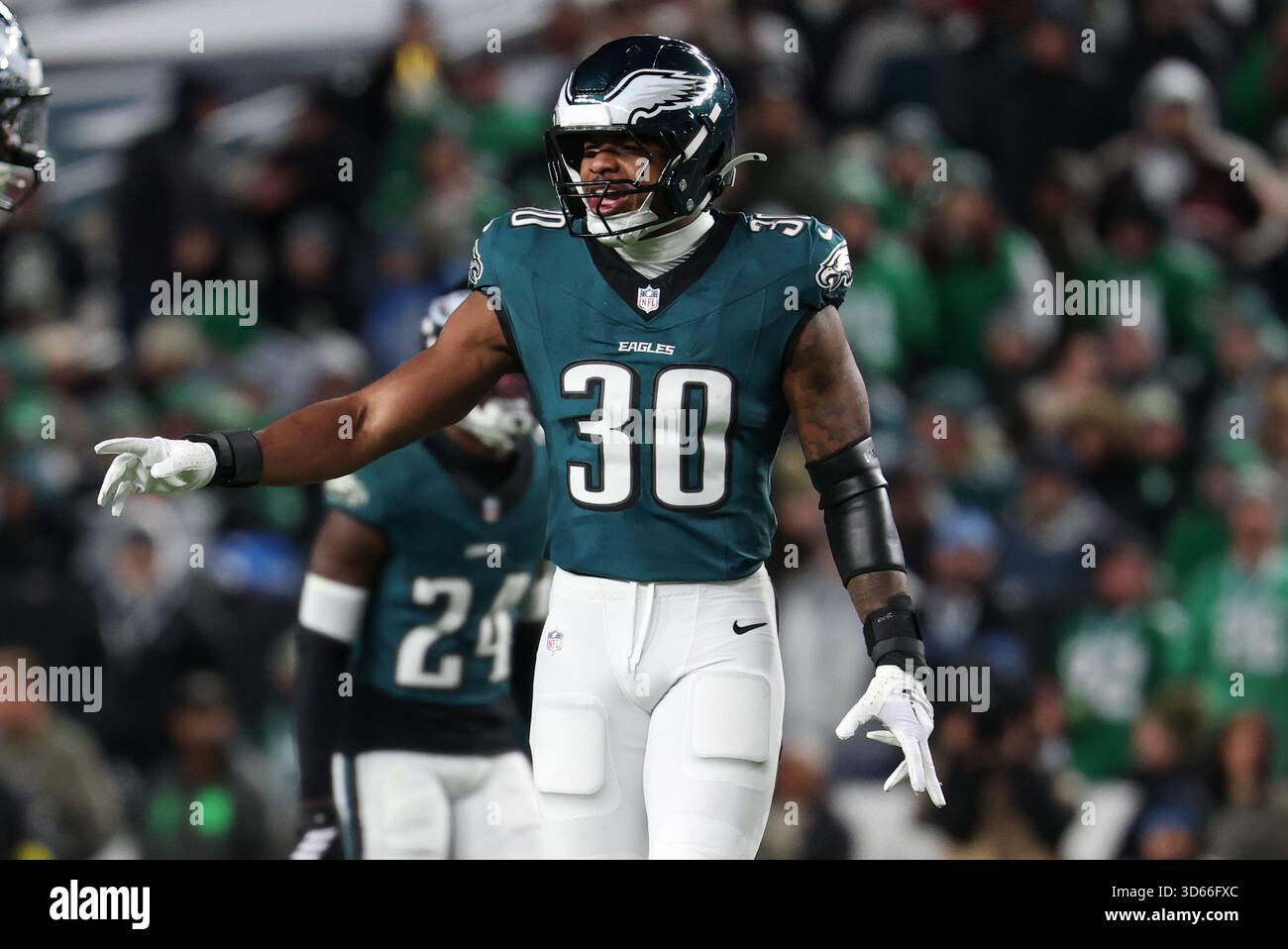 Philadelphia Eagles linebacker Jihaad Campbell (30) gestures between plays during the first half ...
