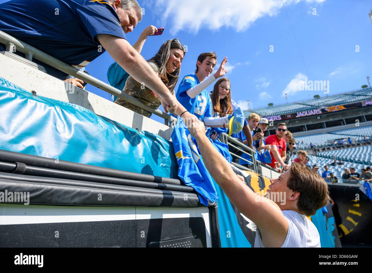 Los Angeles Chargers kicker Cameron Dicker (11) signs autographs for ...