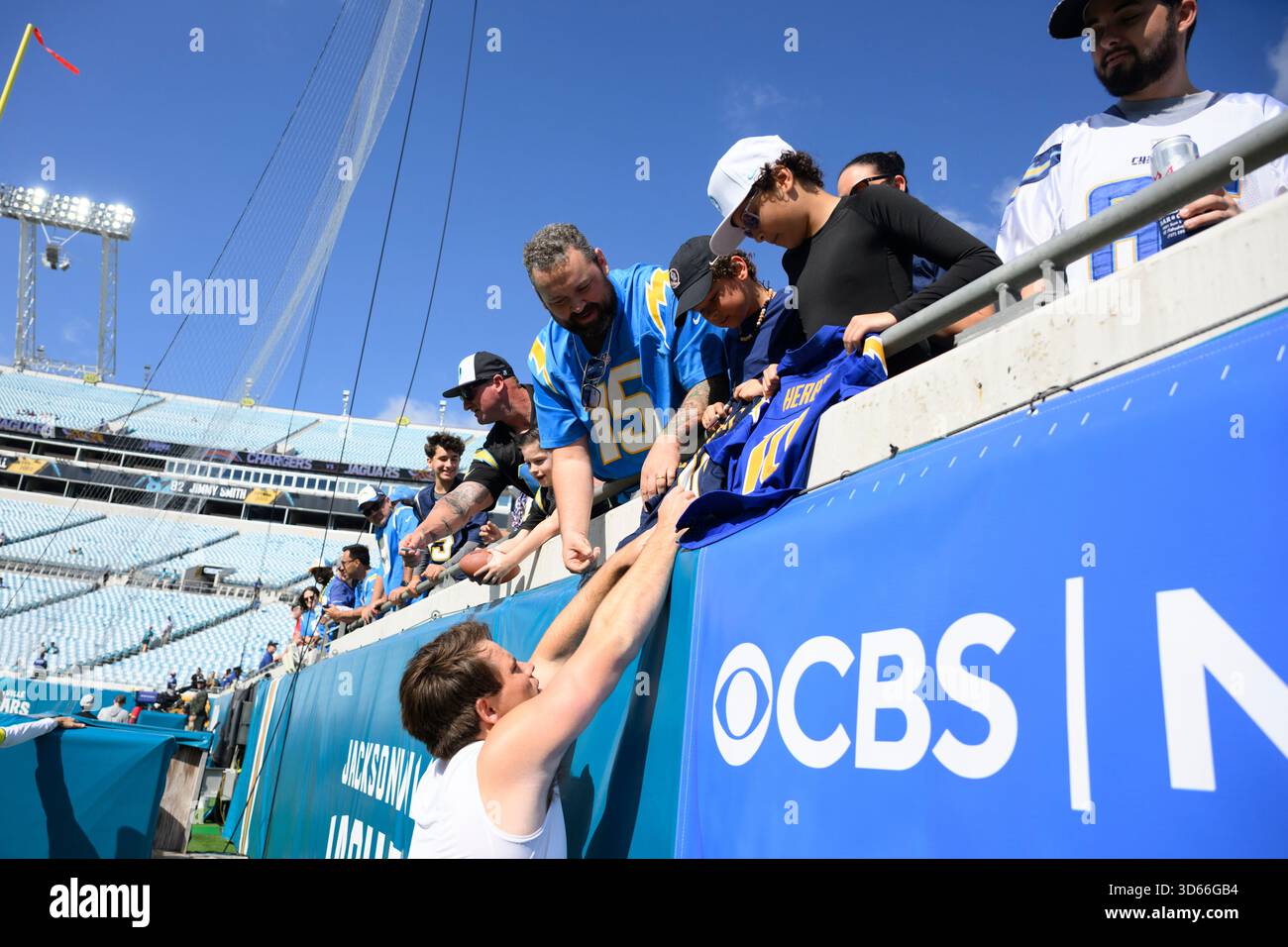 Los Angeles Chargers kicker Cameron Dicker (11) signs autographs for ...