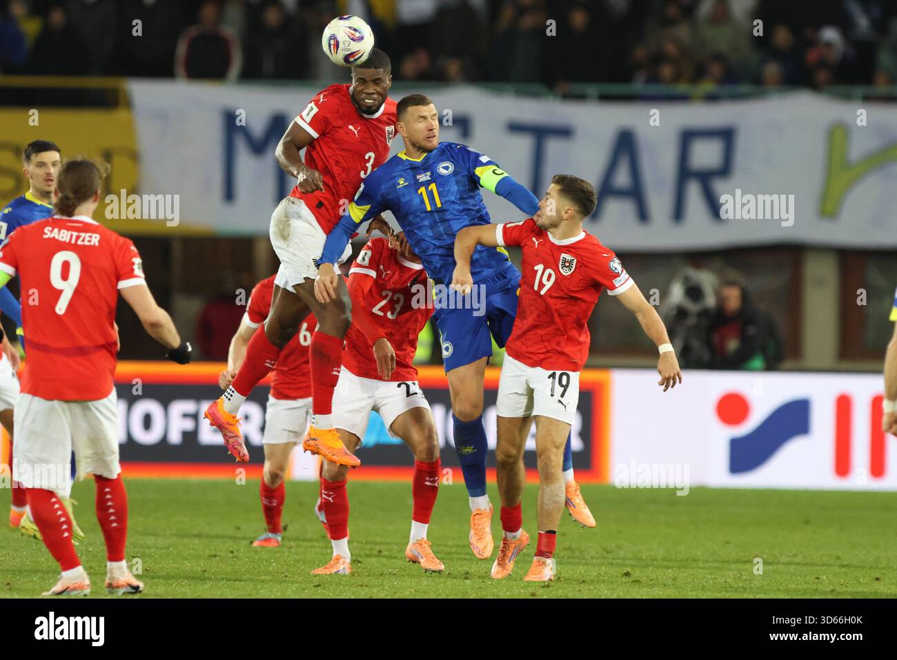 VIENNA, AUSTRIA - NOVEMBER 18: Kevin Danso of Austria and Edin Dzeko of ...