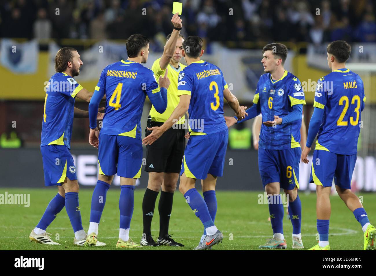 VIENNA, AUSTRIA - NOVEMBER 18: referee Joao Pinheiro of Portugal shows ...