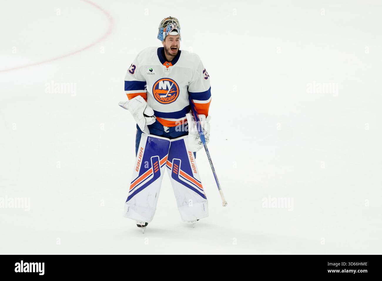 New York Islanders goaltender David Rittich yells for a goalie ...