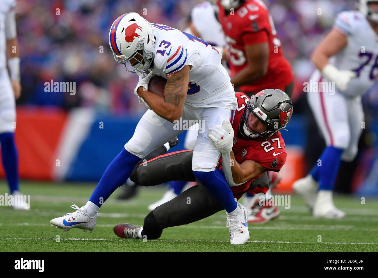 Buffalo Bills wide receiver Gabe Davis (13) is tackled by Tampa Bay ...
